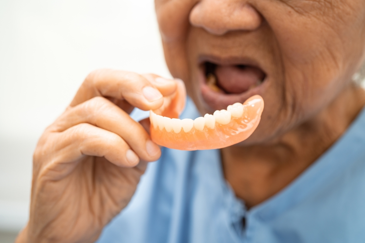 Restore Your Smile with Partial Dentures or Dental Bridges
